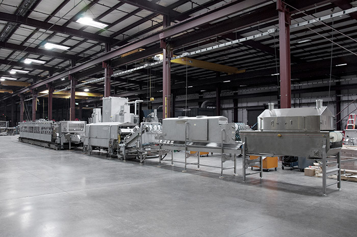 The Taco-Form frying system can deliver up to 2,000 dozen taco shells ...